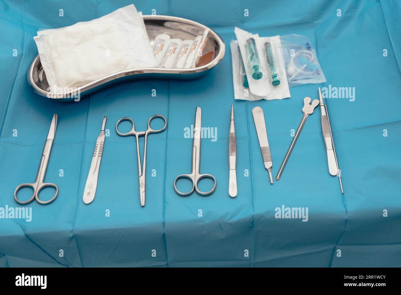 Top view of assorted clean surgical tools of forceps and tweezers with ...