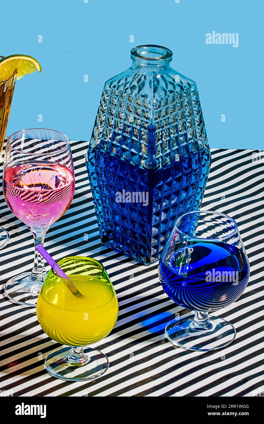 From above glass jar with blue color cocktail and varieties of colorful ...