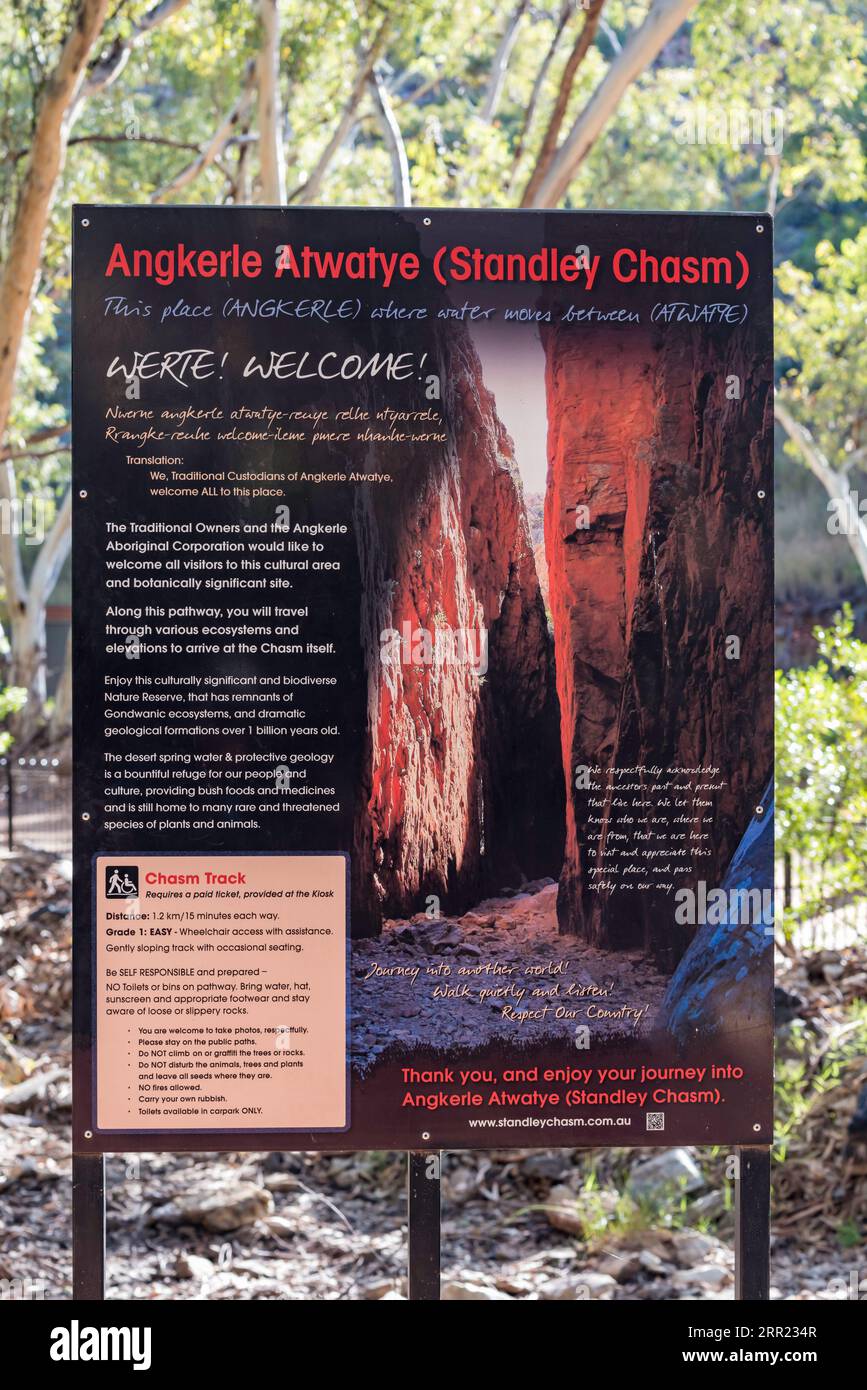 A sign at the entrance to Standley Chasm (Angkerle Atwatye) in both ...