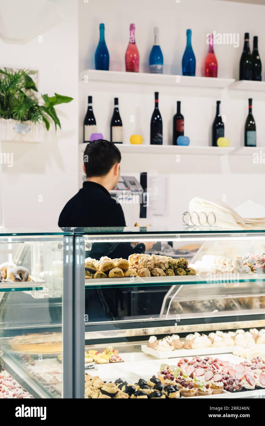 Italian Bakery counter, Window of desserts at a pastry shop. Fresh and ...