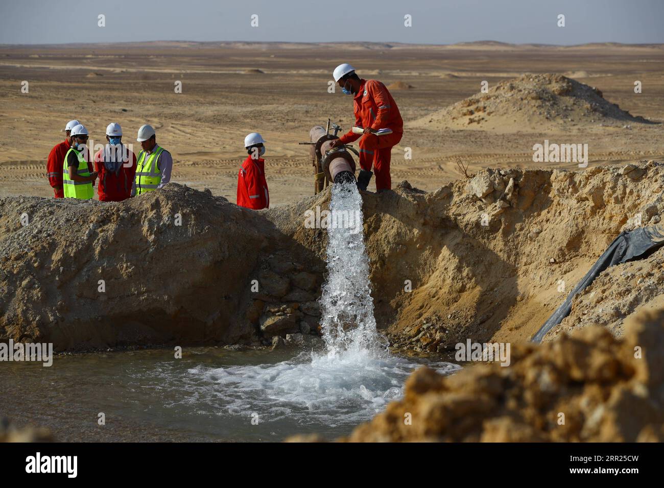 201003 -- MINYA, Oct. 3, 2020 -- Water runs out from a well dug by the ...