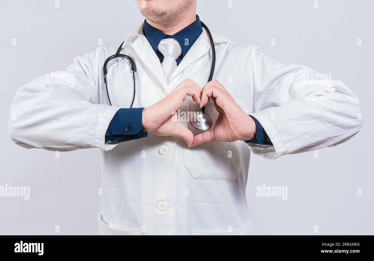 Doctor making heart gesture with hands. Concept of love and medicine ...