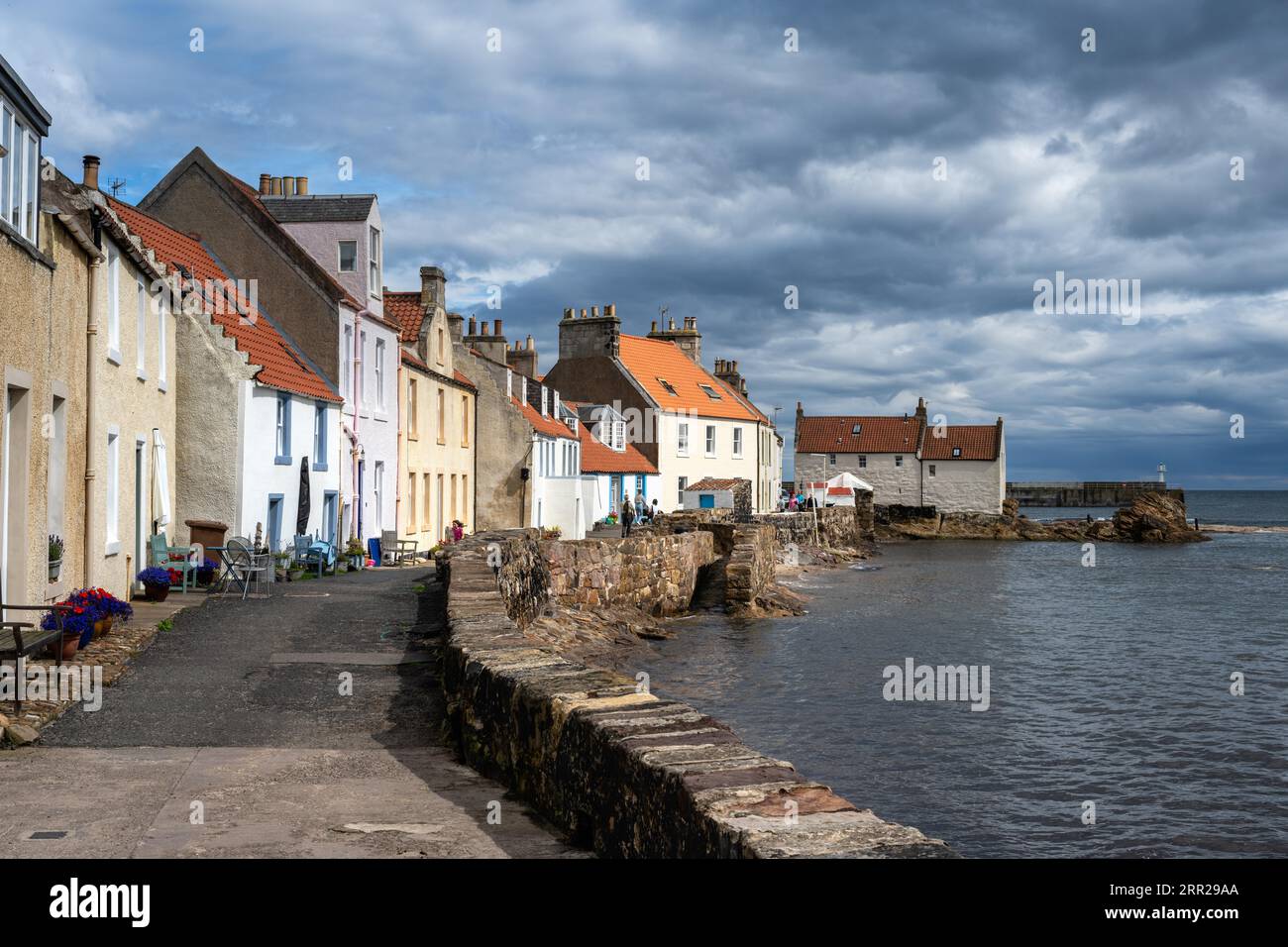 Traditional old dwellings lined up along the Fife Coastal Path in the ...