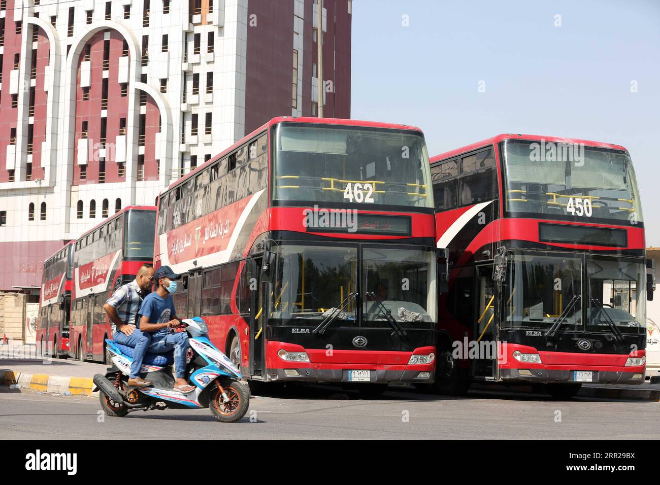 201006 -- BAGHDAD, Oct. 6, 2020 -- Red double-decker buses are seen in ...