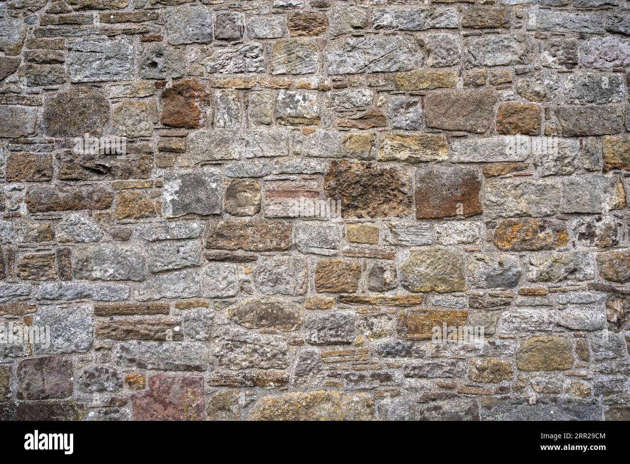 Wall stones made of different types of stone, full-size, background, St ...