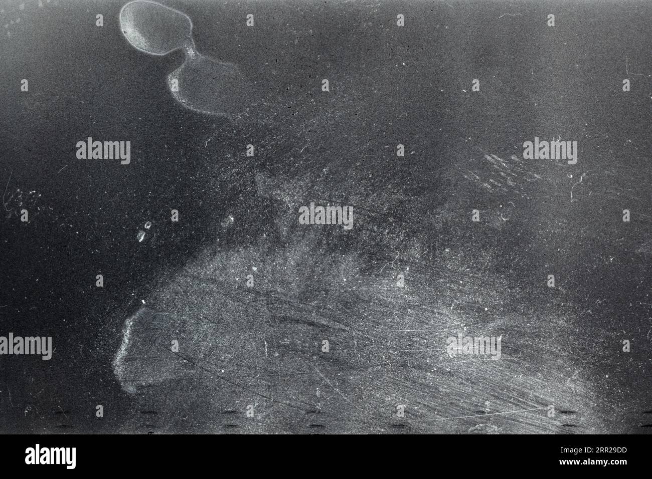 Blank grained film strip texture background with heavy grain, dust and ...