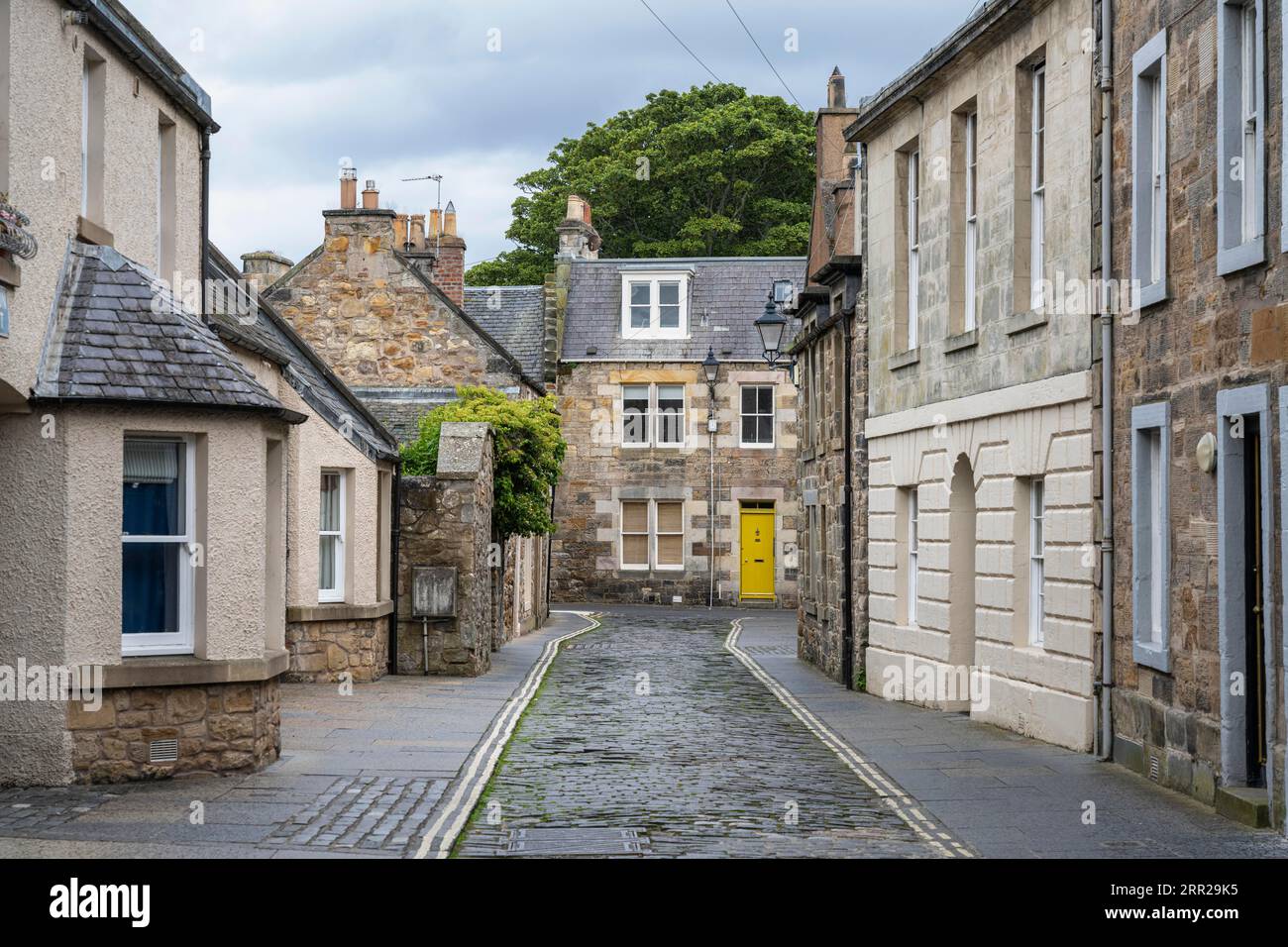 Old stone houses, cobbled streets in the old town of St Andrews, County ...