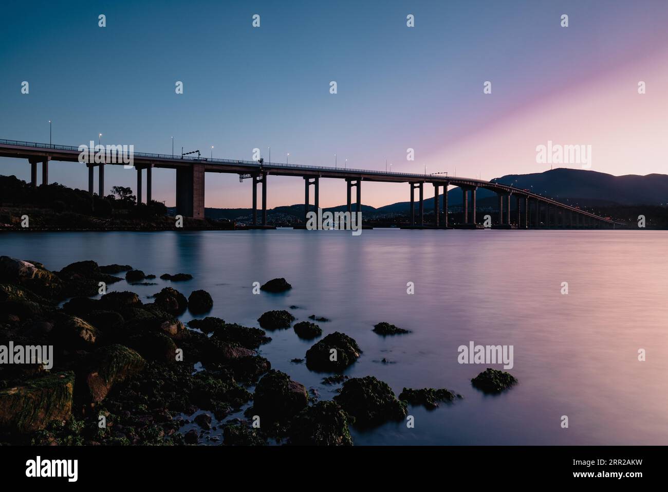 The iconic Tasman Bridge at dusk on a clear spring evening crossing the ...