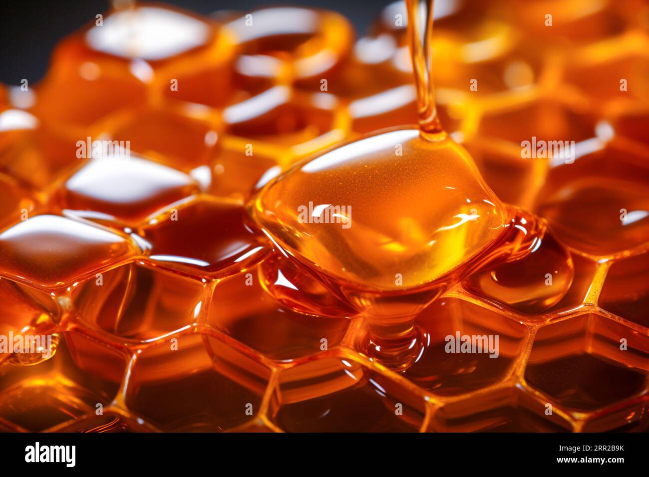 Macro detailed bright golden honey and honeycombs. Liquid sticky ...