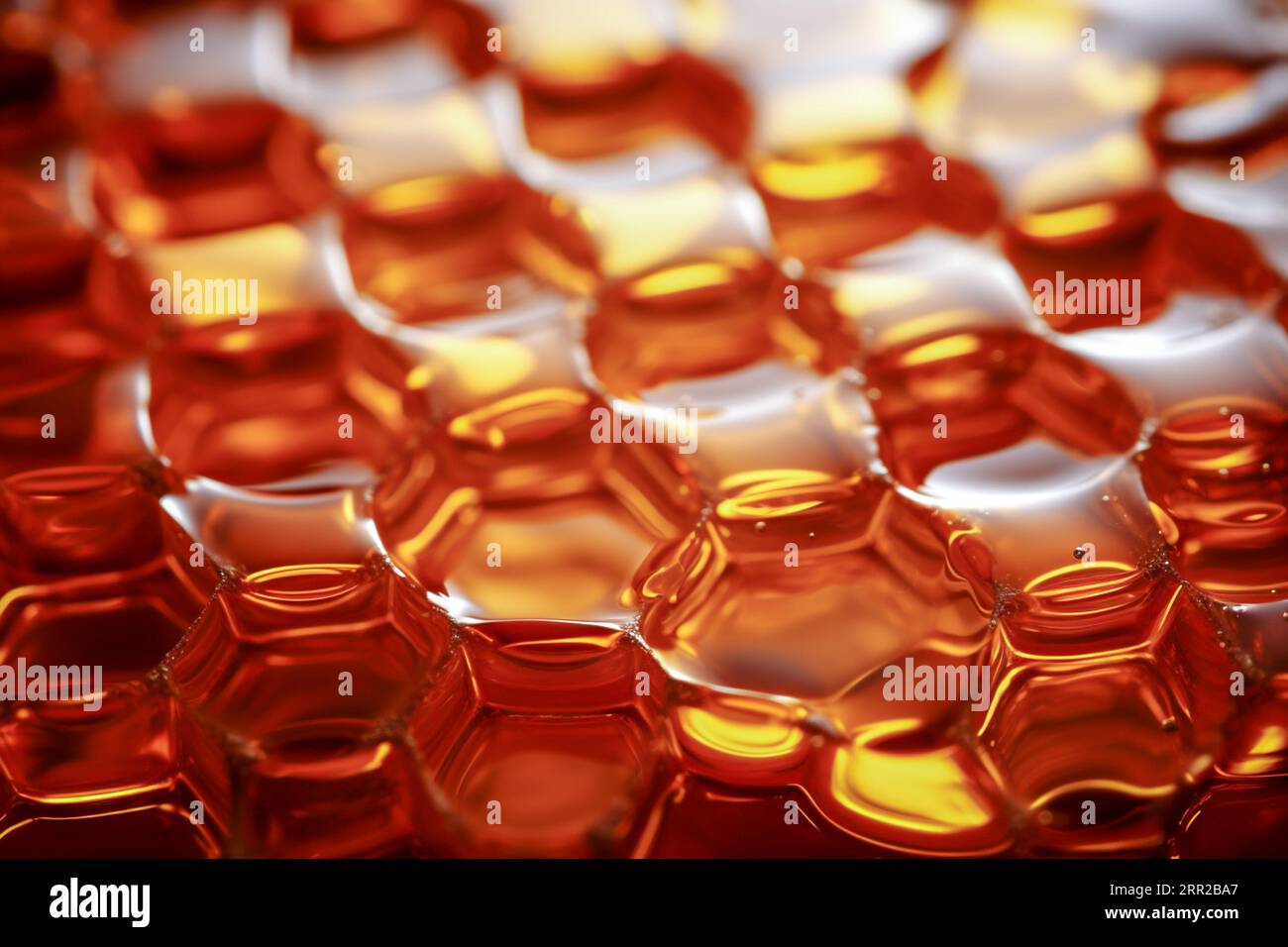 Macro detailed bright golden honey and honeycombs. Liquid sticky ...