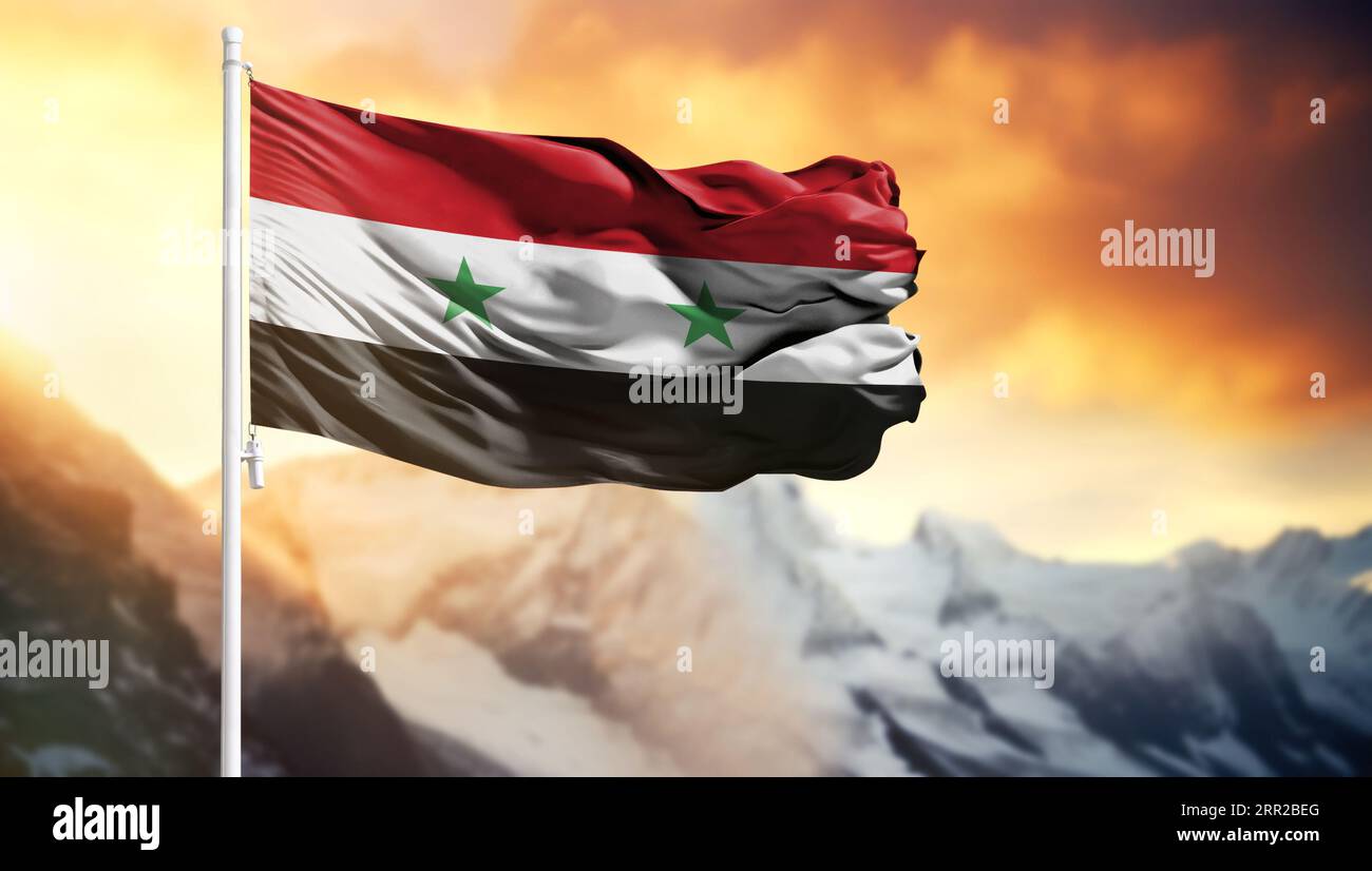 Flag of Syria on a flagpole against a colorful sky Stock Photo - Alamy