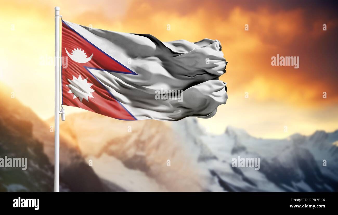 Flag of Nepal on a flagpole against a colorful sky Stock Photo - Alamy