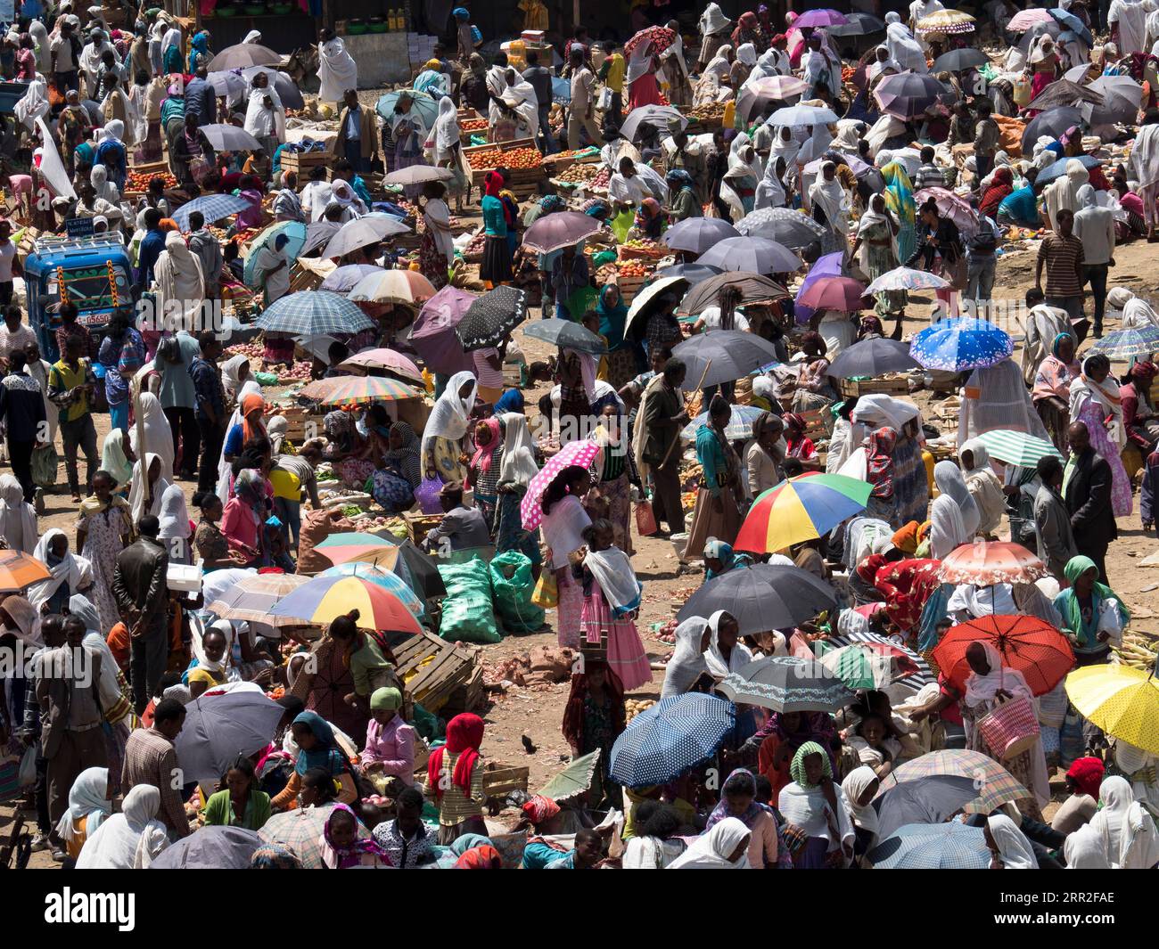 Many people crowded around the market, market hustle and bustle, Axum ...