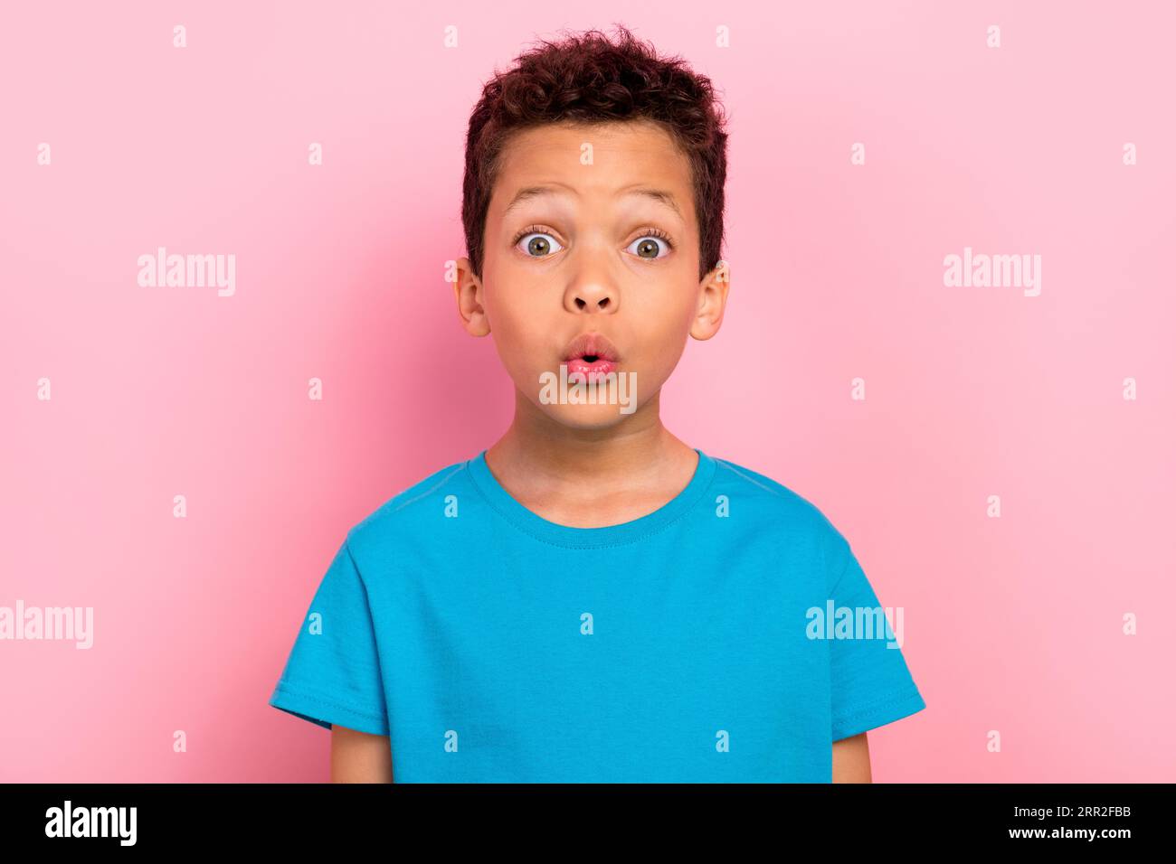 Photo portrait of сute little boy look camera astonished shocked face ...