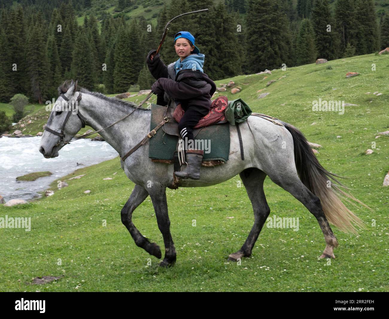 Little boy riding a horse, Jety Oguz, Kyrgyzstan Stock Photo - Alamy