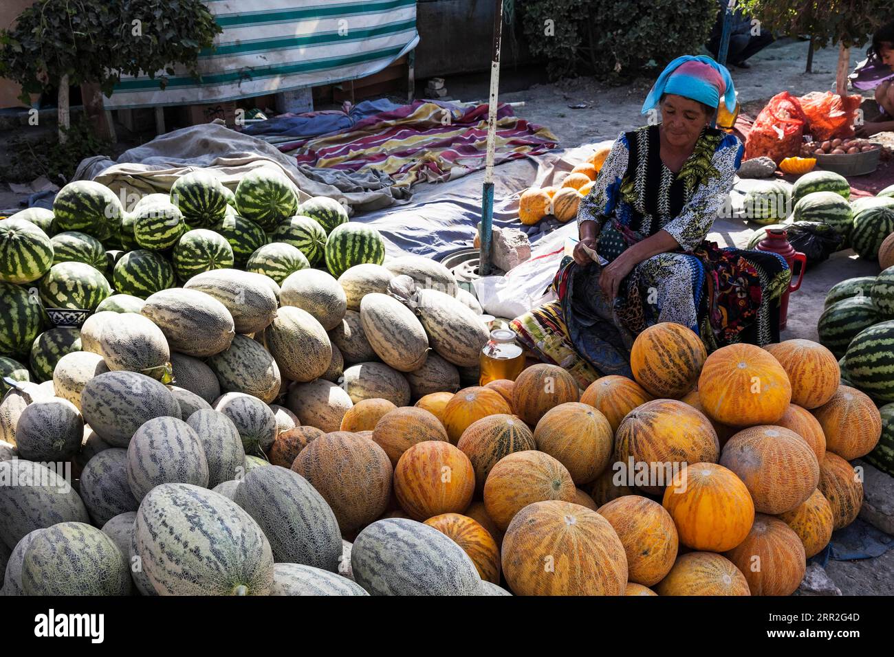 Melon seller, Melons, Market, Uzbekistan Stock Photo - Alamy