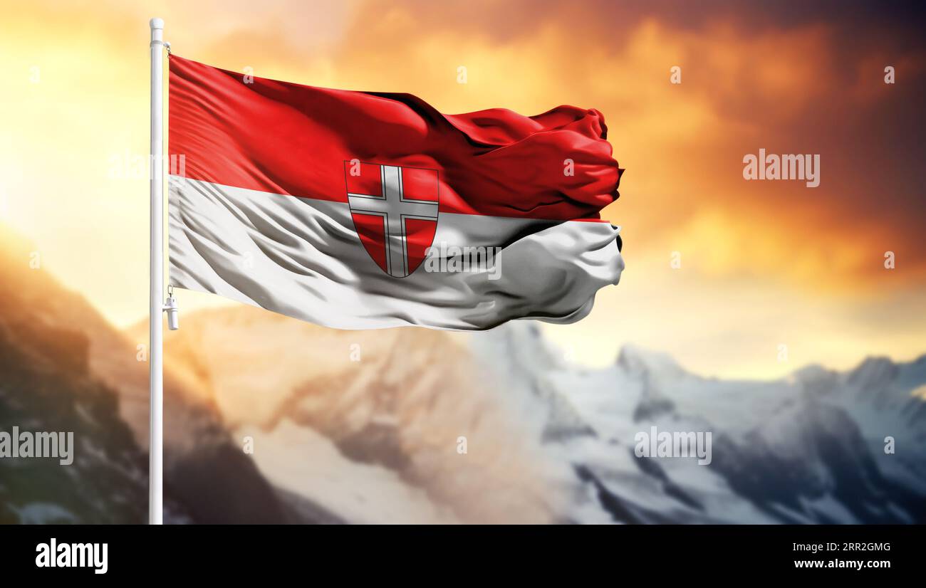 Flag of Vienna on a flagpole against a colorful sky Stock Photo - Alamy