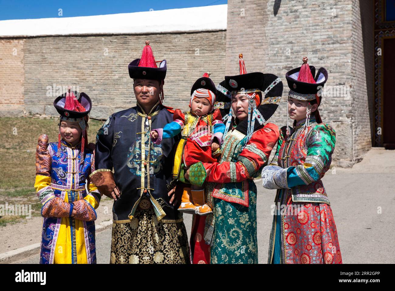 Mongolian family in traditional costume hi-res stock photography and ...