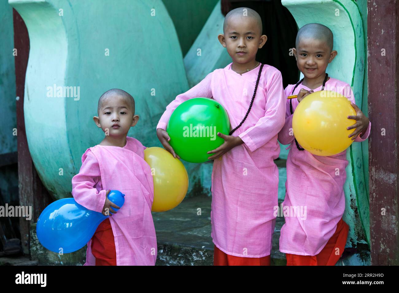 Novices, girls with balloons, Taungu, Bago Division, Myanmar, Burma ...