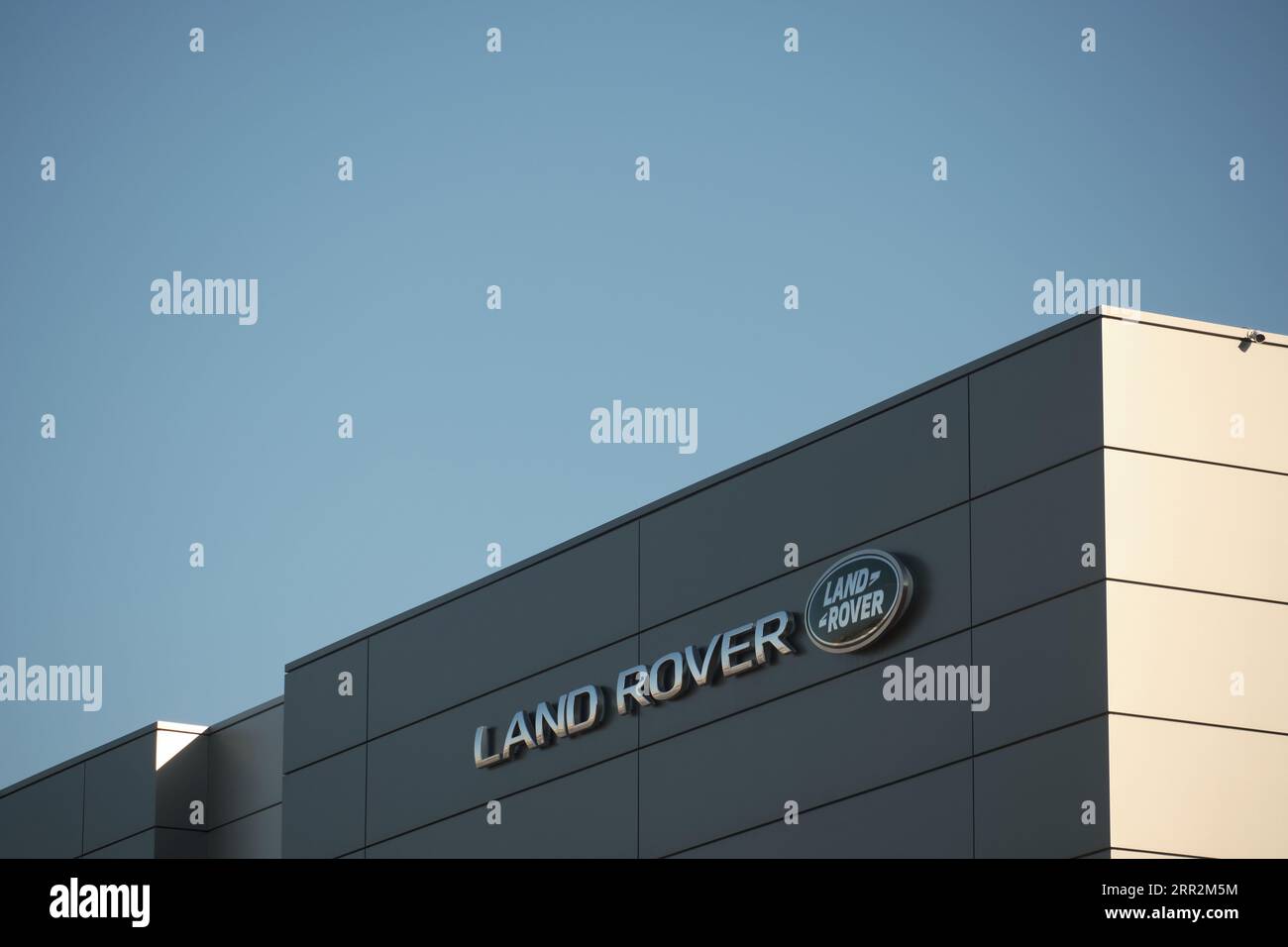 Land Rover logo at building facade Stock Photo - Alamy