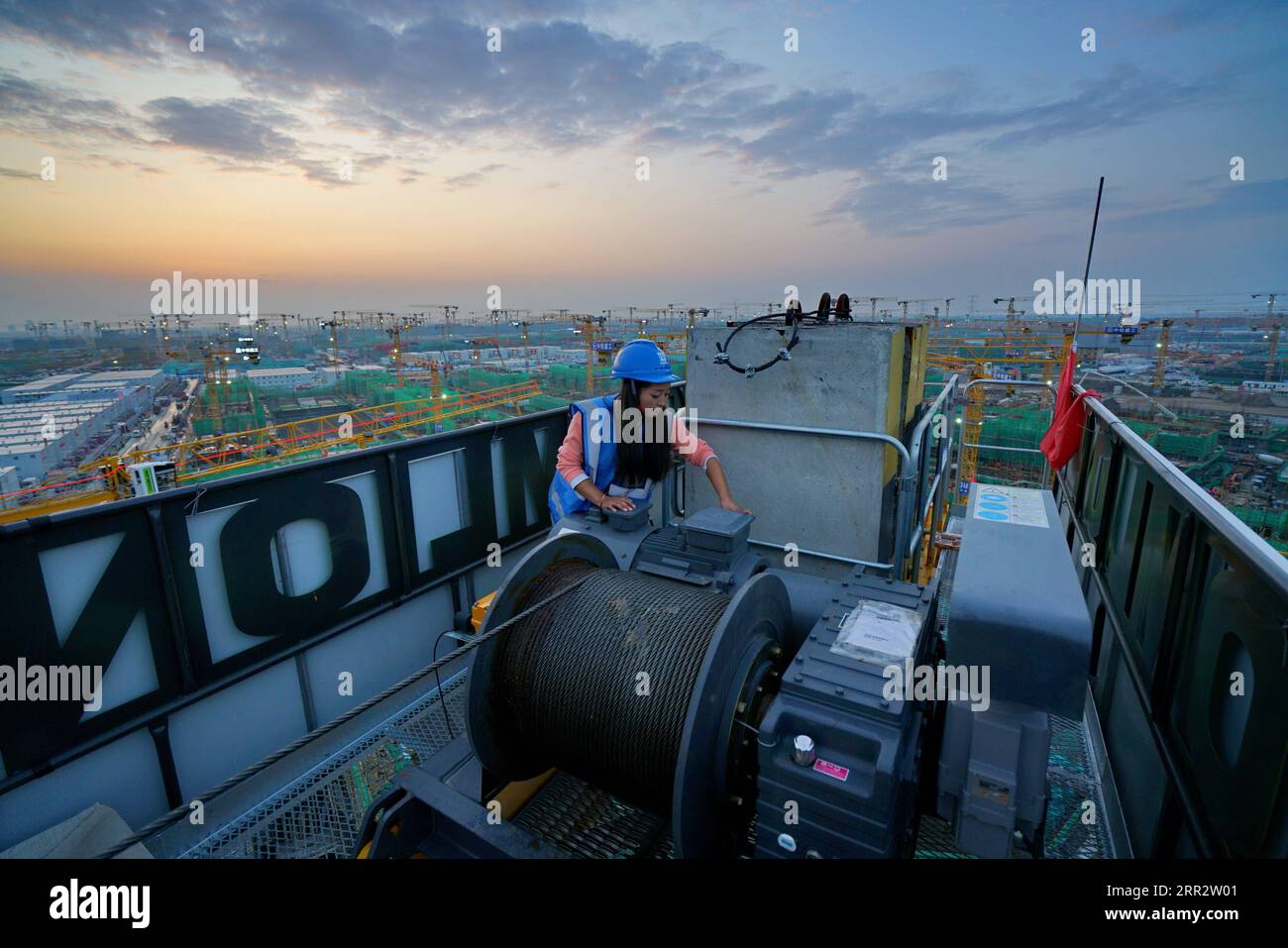 Tower crane driver china hi-res stock photography and images - Alamy