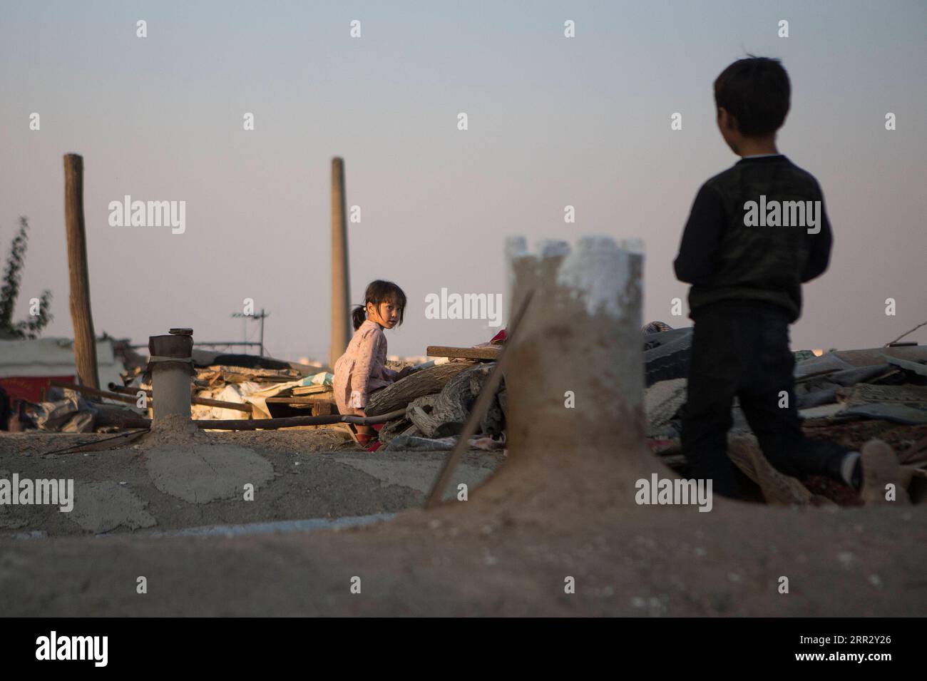 201017 -- TEHRAN, Oct. 17, 2020 -- Children are seen in a slum on the ...