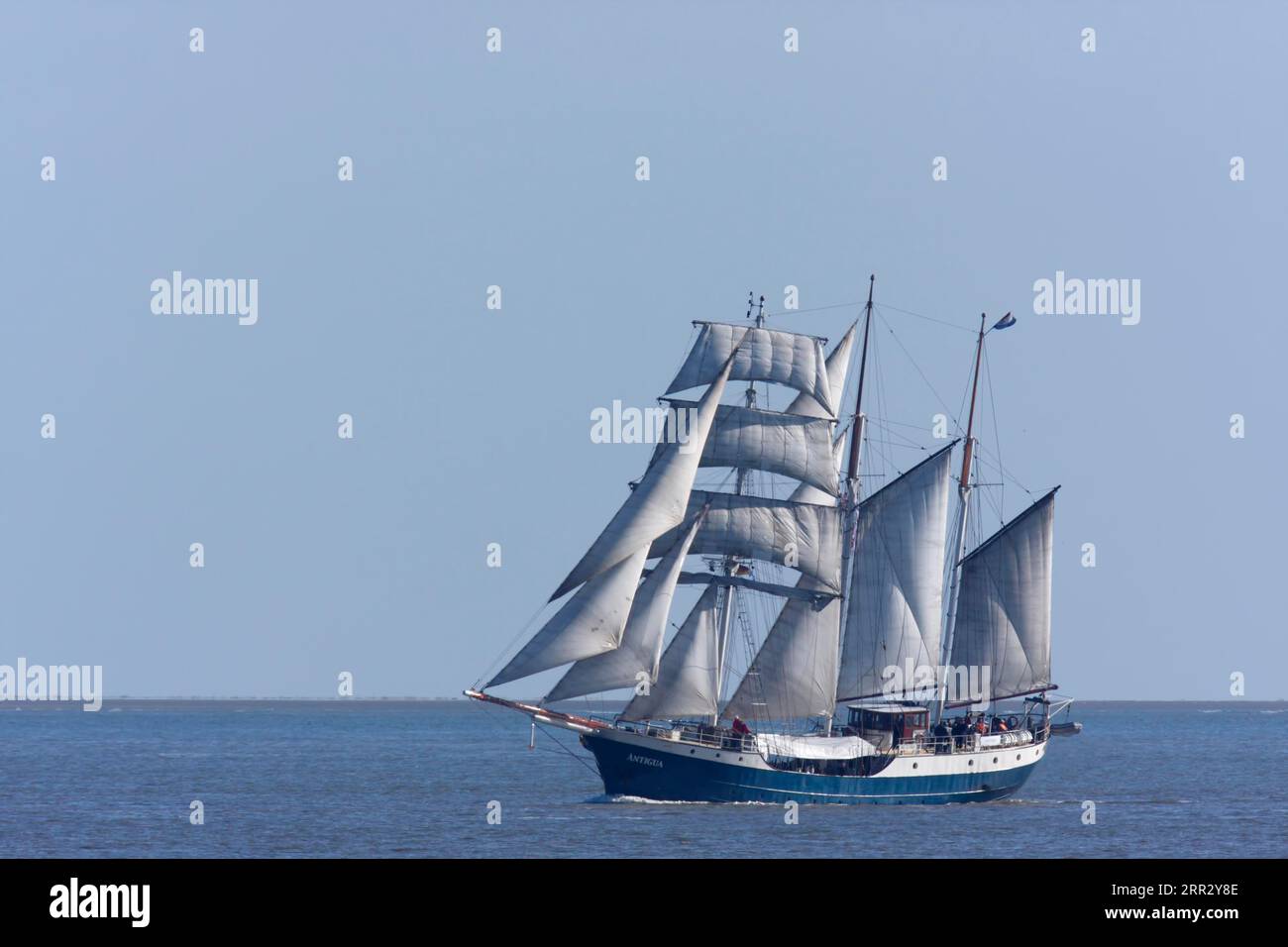 Three-masted sailing vessel, barquentine Antigua under sail in the ...