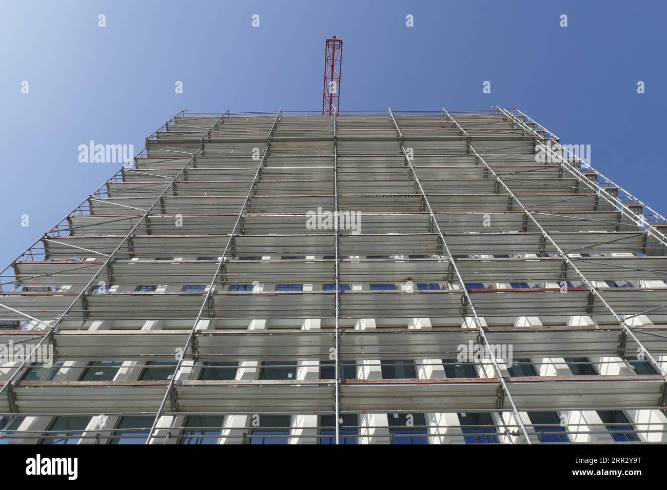 Shell of a commercial building, scaffolding, construction site ...