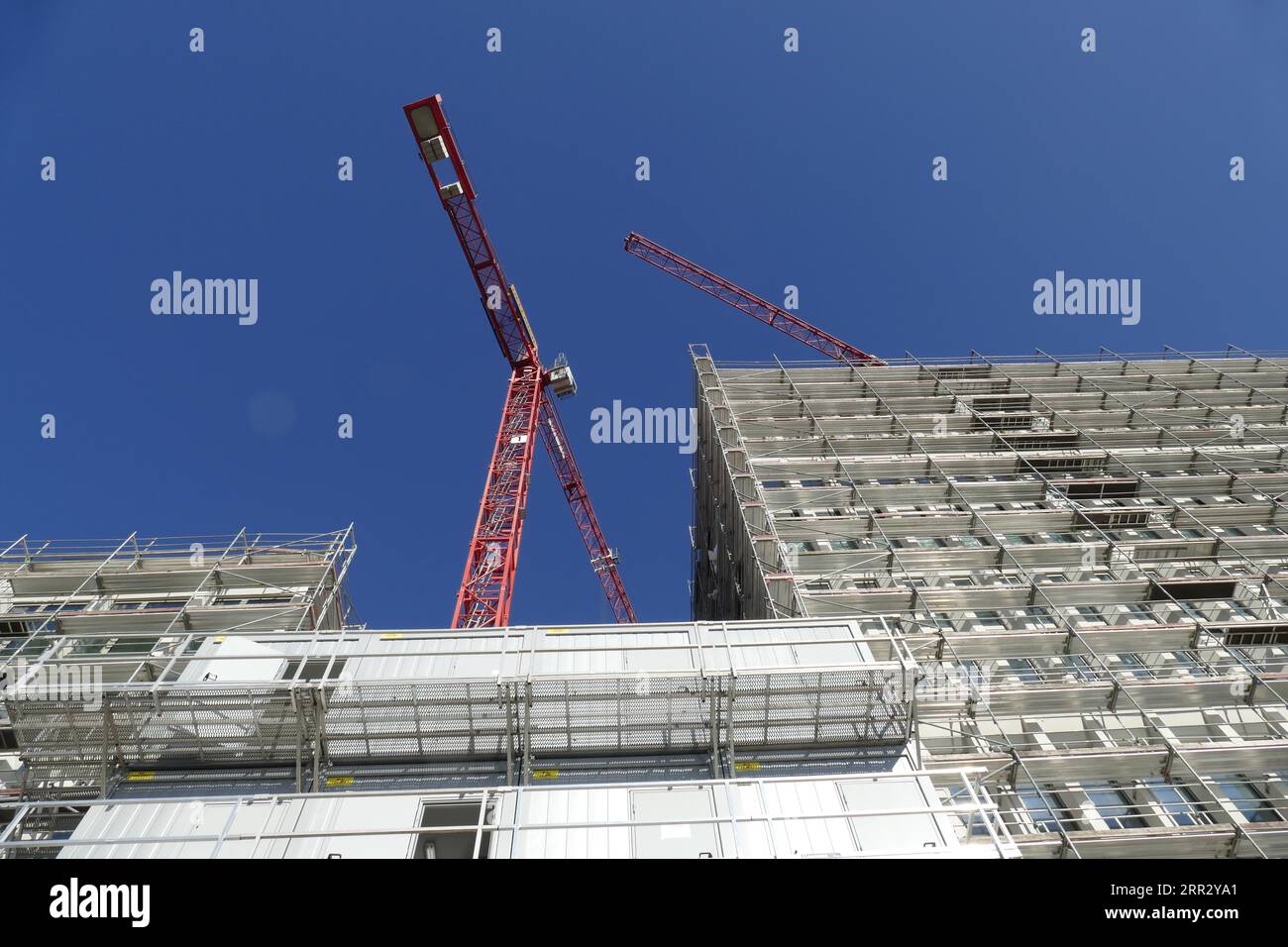 Shell of a commercial building, scaffolding, construction site ...