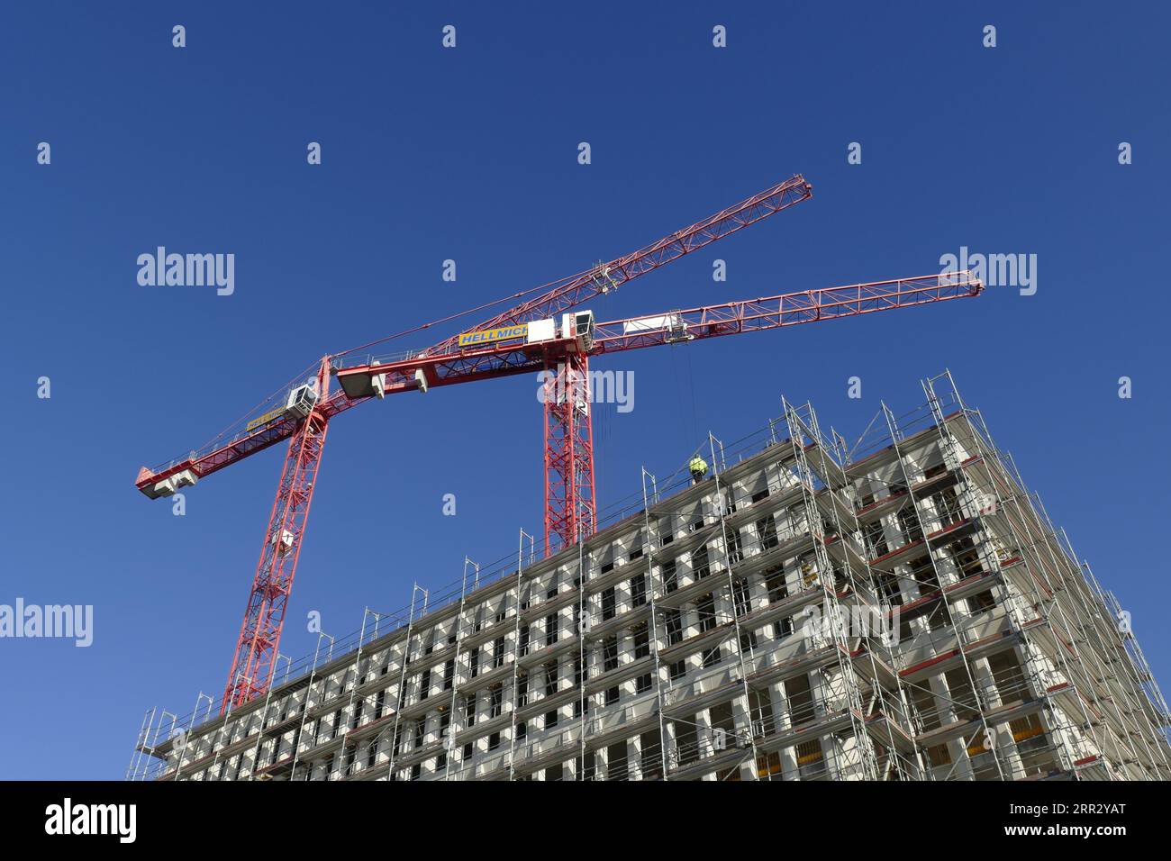 Shell of a commercial building, scaffolding, construction site ...