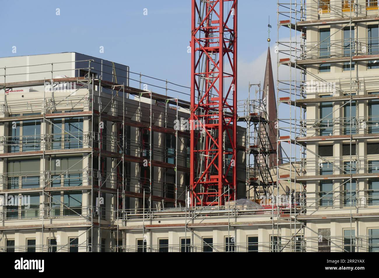 Shell of a commercial building, scaffolding, construction site ...