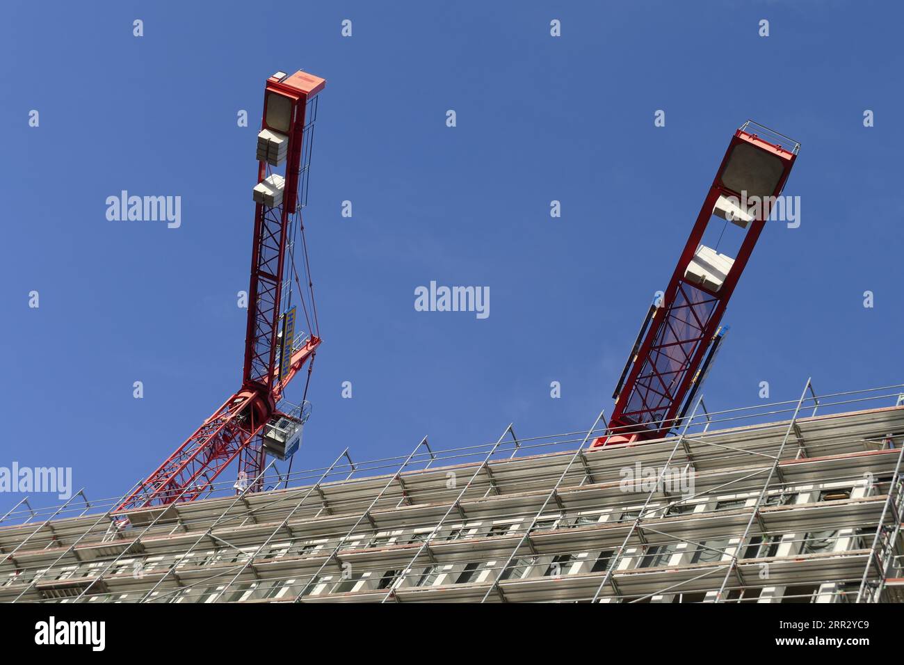 Shell of a commercial building, scaffolding, construction site ...