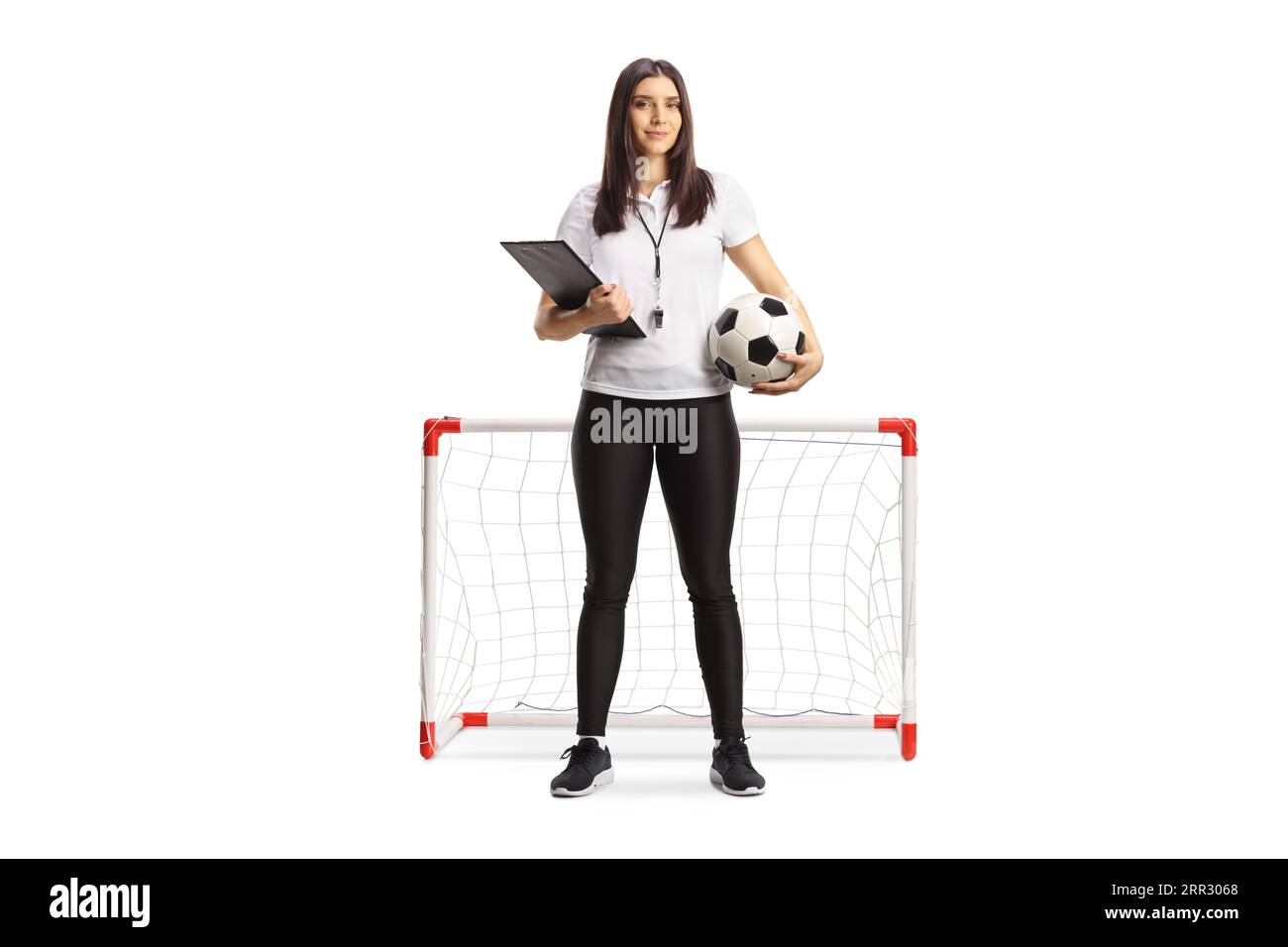 Full length portrait of a female football coach posing in front of a ...