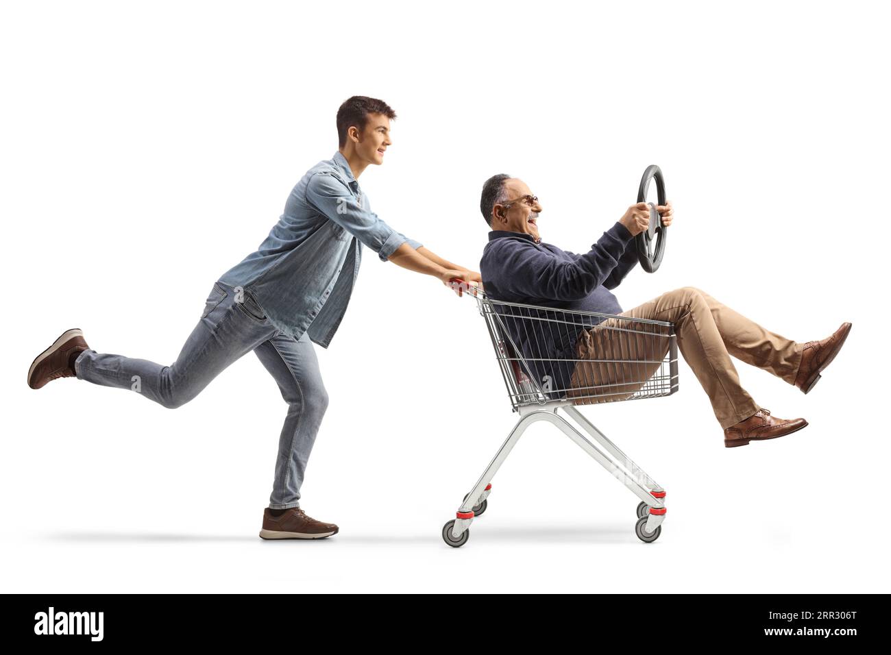 Guy pushing a mature man holding a steering wheel and sitting inside a ...