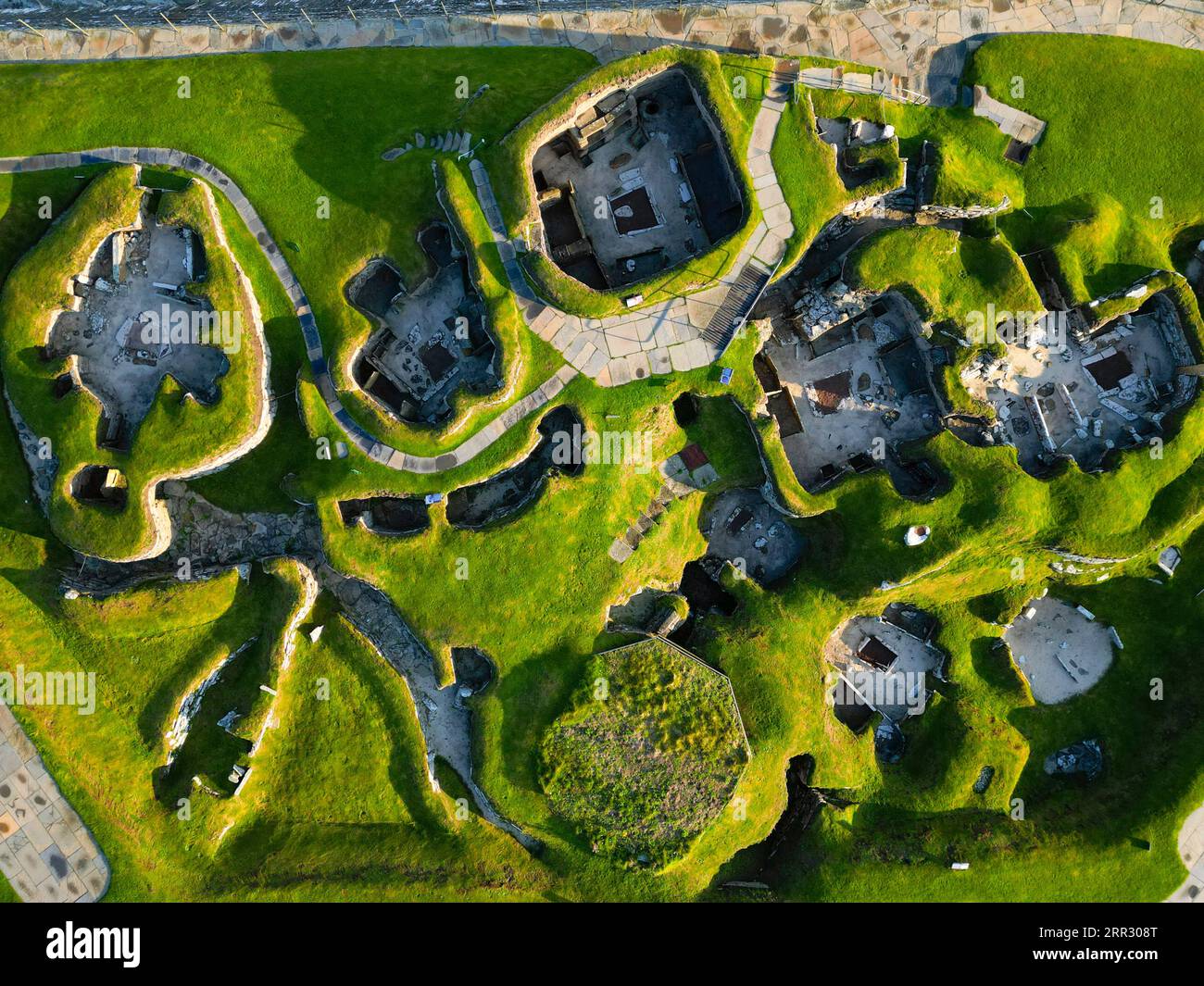 Aerial view of Skara Brae stone-built Neolithic settlement, located on ...