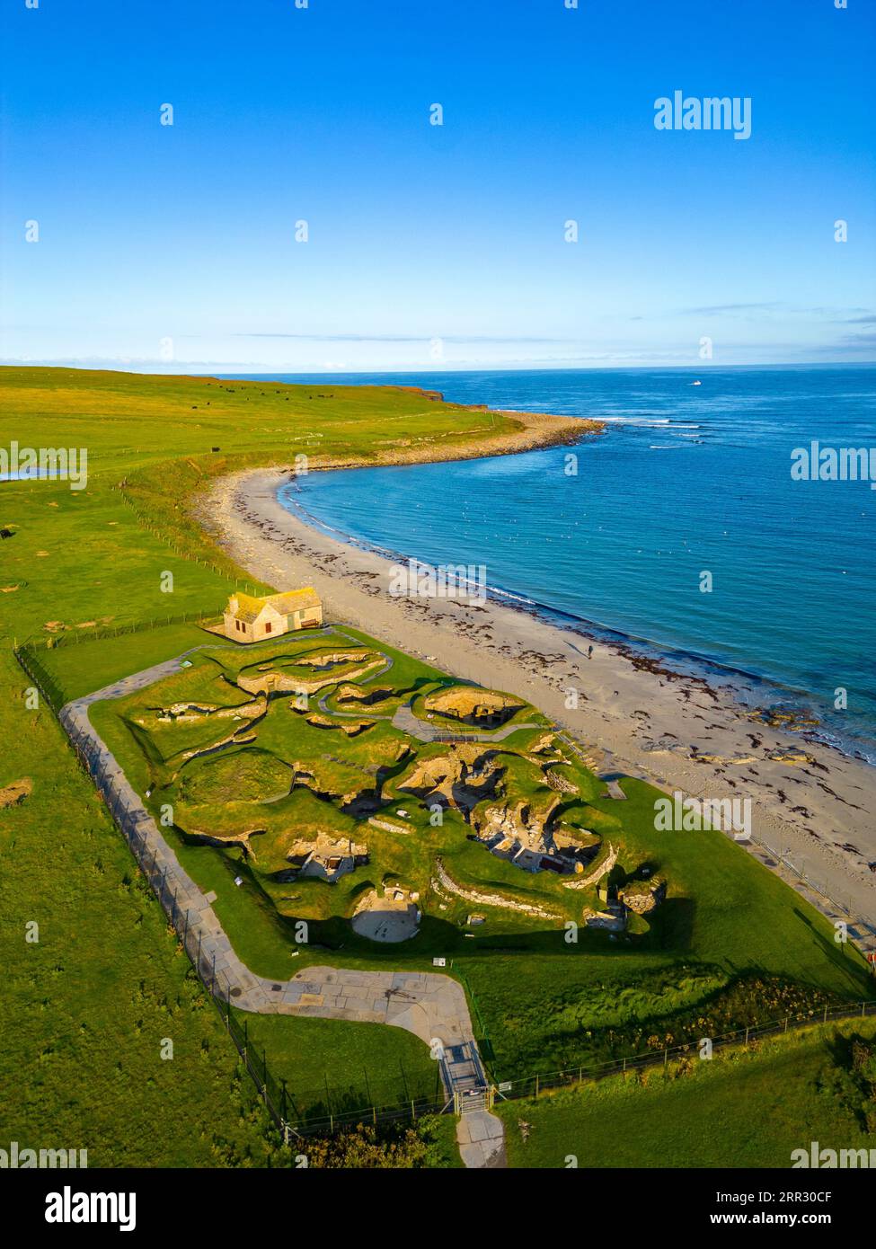 Aerial view of Skara Brae stone-built Neolithic settlement, located on ...