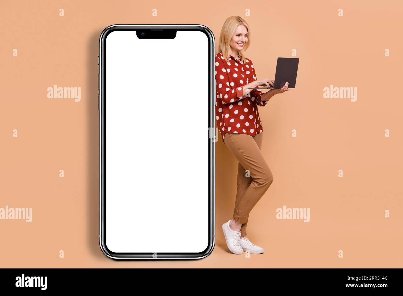 Full body photo of charming aged lady use wireless netbook huge empty ...