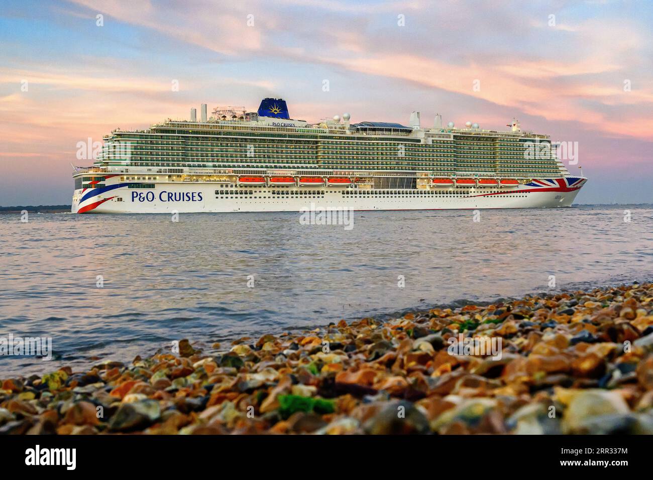 Sunset sailing of Arvia, an LNG-powered Excel class cruise ship ...