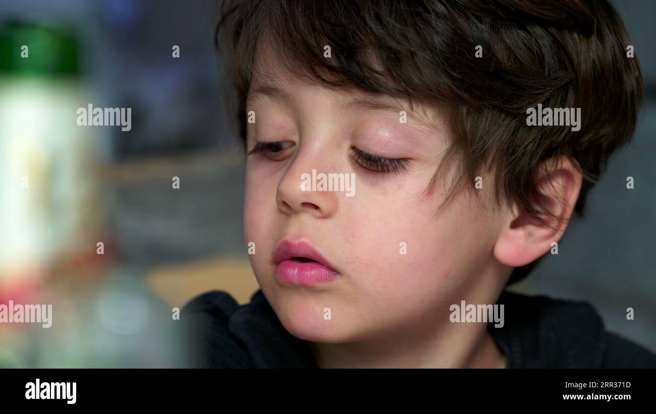 Youngster's Distanced Gaze and Evident Boredom, Rolling Eyes. bored kid ...