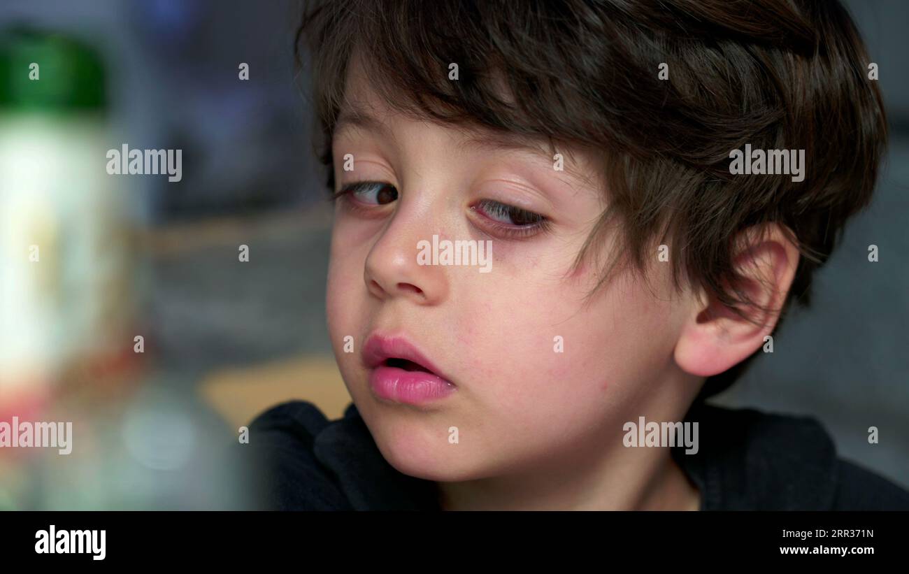 Youngster's Distanced Gaze and Evident Boredom, Rolling Eyes. bored kid ...