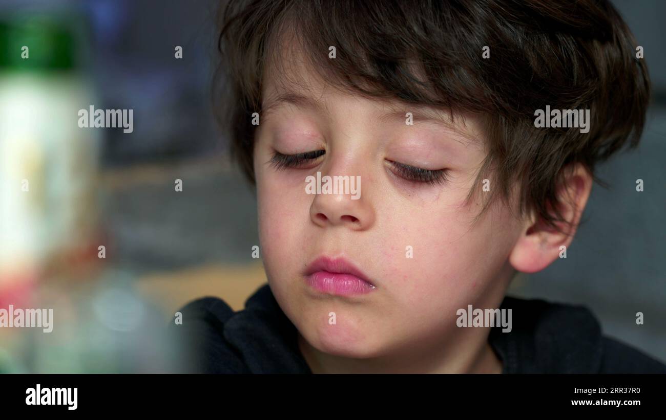 Youngster's Distanced Gaze and Evident Boredom, Rolling Eyes. bored kid ...