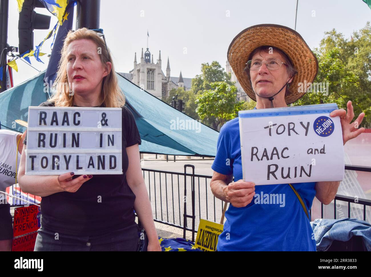 London, England, UK. 6th Sep, 2023. Protesters hold signs referencing ...