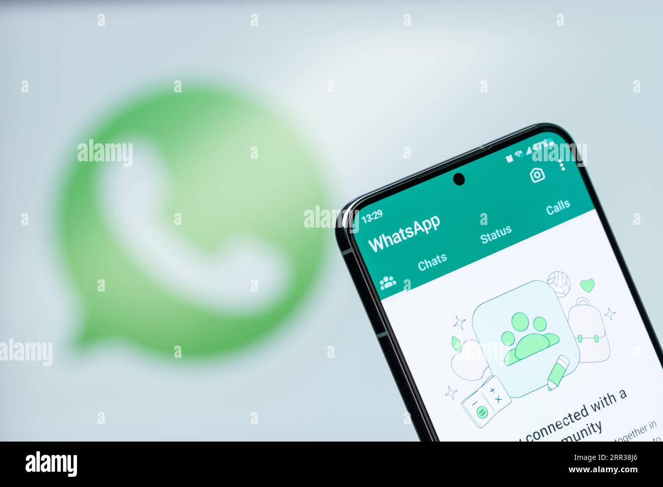 New York, USA - August 20, 2023: Selecting chat in whatsapp app on ...