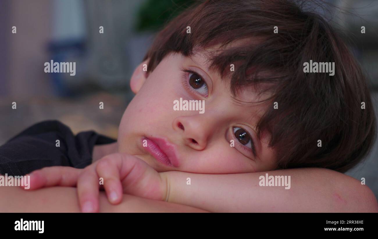 Portrait despondent child deep in hi-res stock photography and images ...