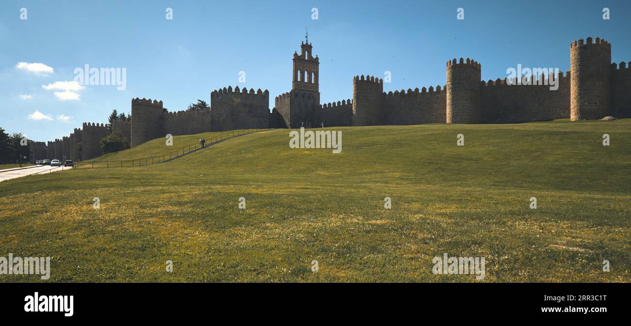 View to The Walls of Avila historic city, against blue sky during sunny ...
