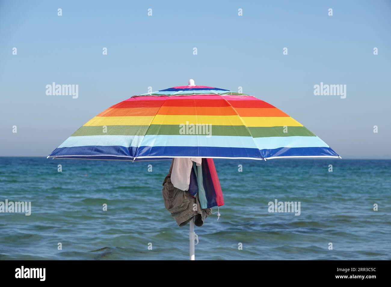 06 September 2023, Schleswig-Holstein, Scharbeutz: A parasol stands on ...
