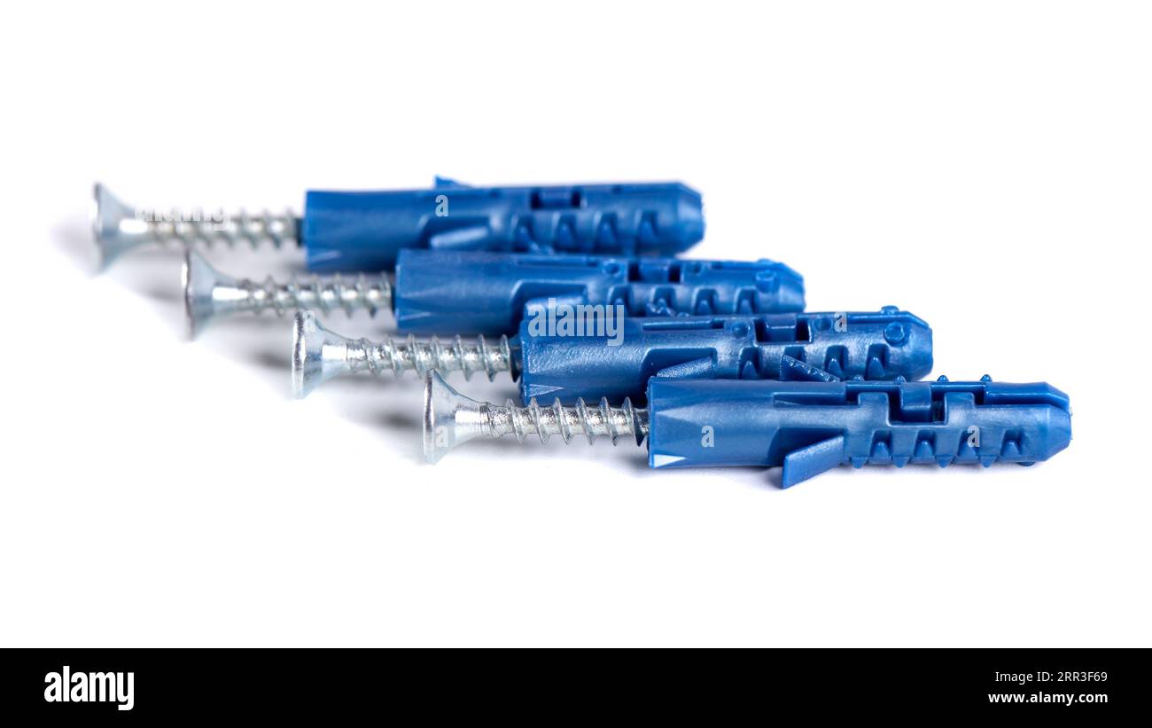 Chrome screws on white background. Self-tapping screws from steel close ...