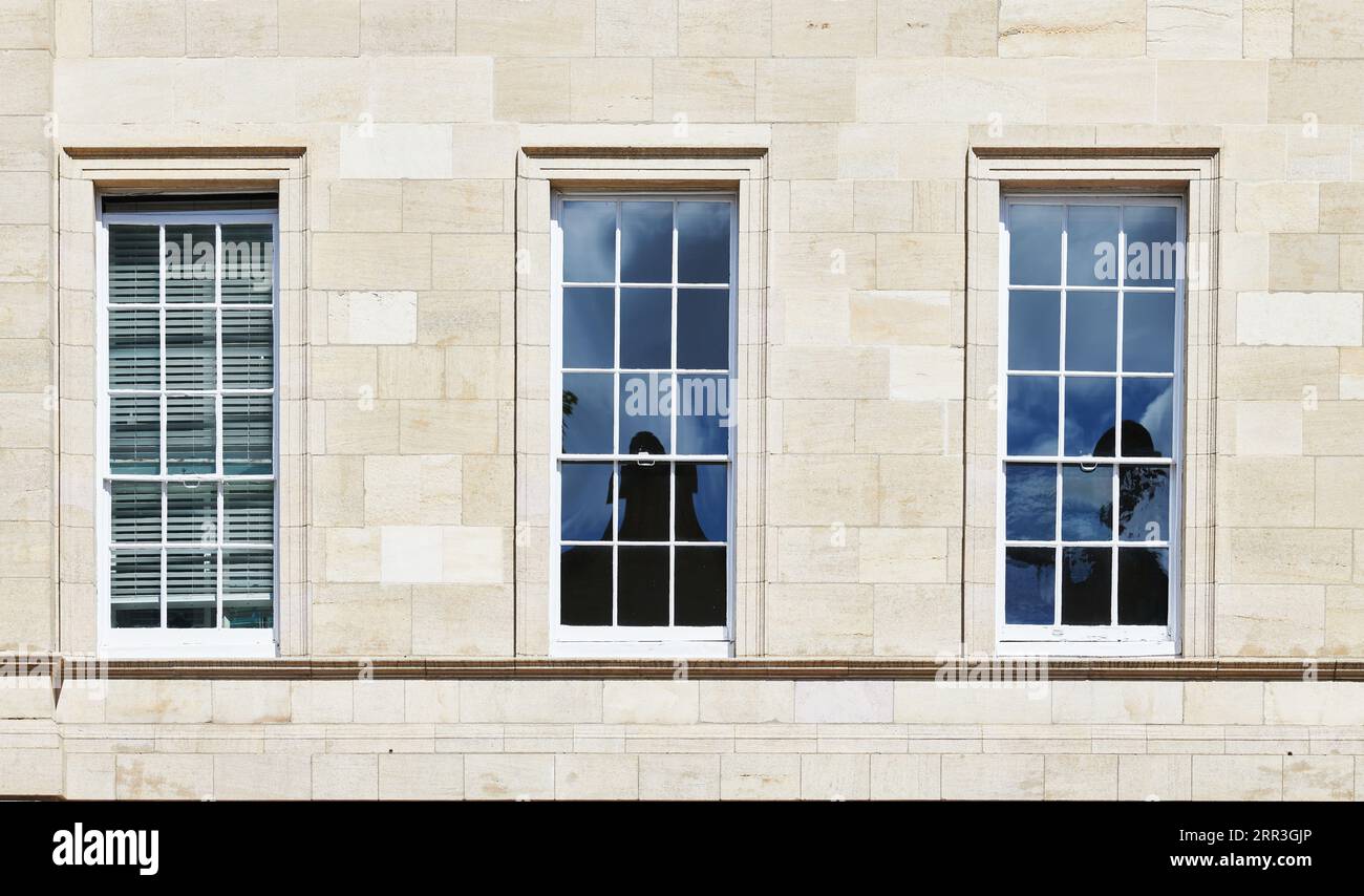 A trio of windows at Queen's College, university of Oxford, England ...