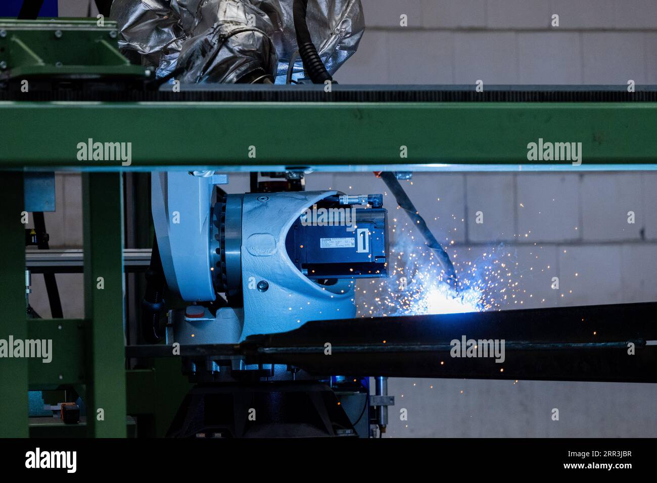 Witten, Germany. 30th Aug, 2023. A robot welds a frog of a switch at ...