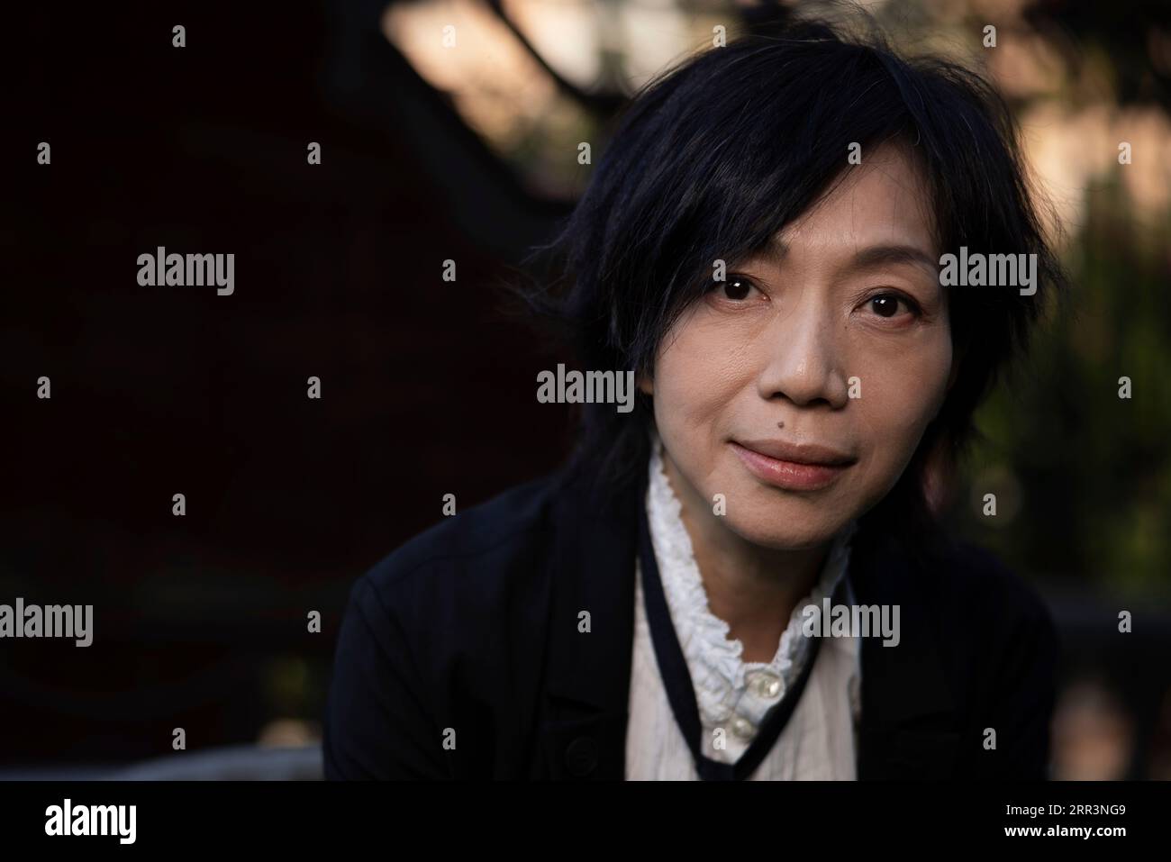 Lin Wanfang poses for portraits to promote the film 'Snow in Midsummer ...